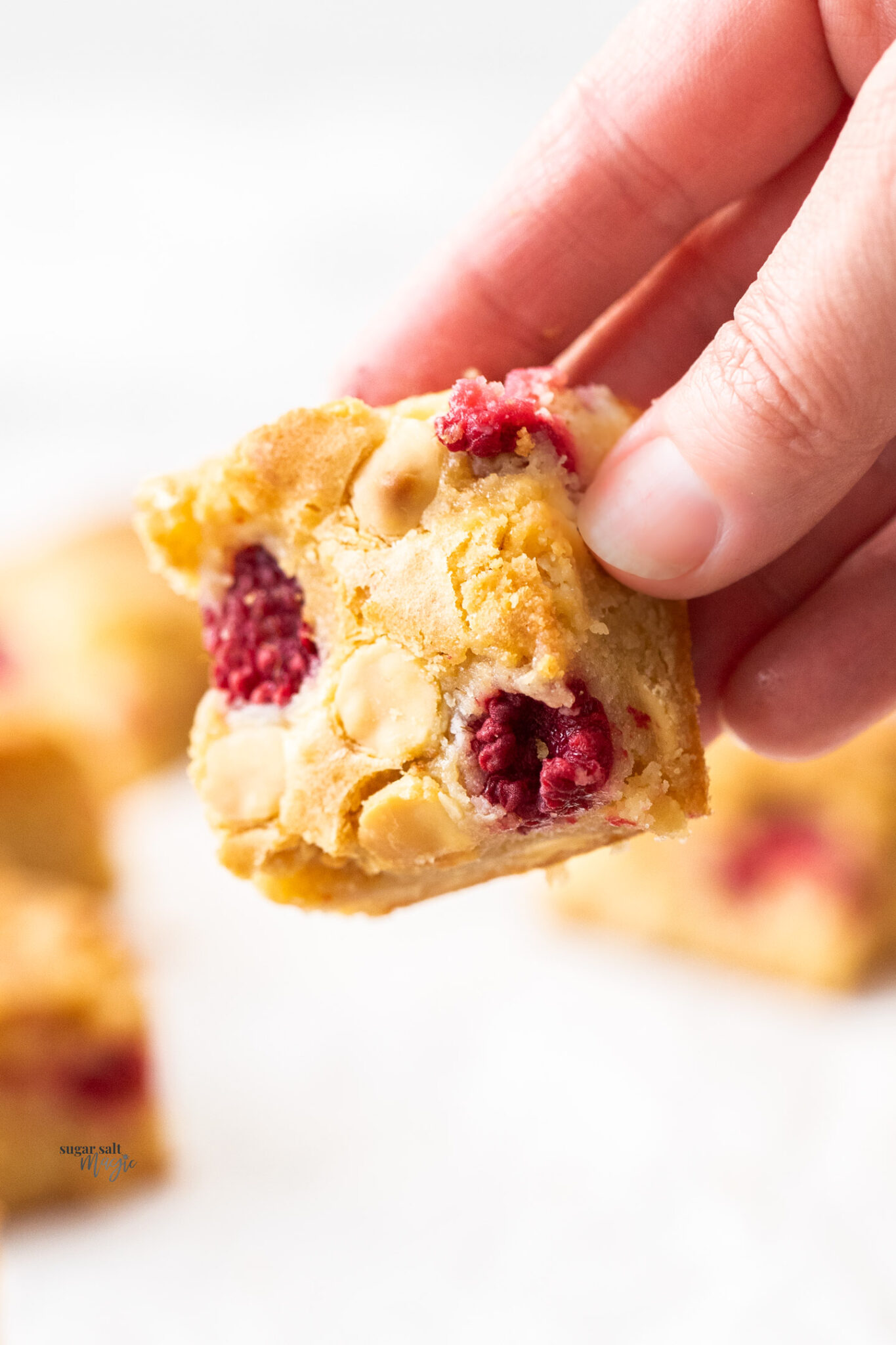 White Chocolate and Raspberry Blondies - Sugar Salt Magic